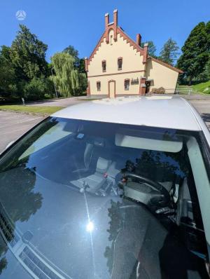 White Skoda SuperB 2010 in Vilnius, with an engine capacity of 1.97 L and mileage of 427 thousand km for 2850 €, photo 13 on AUTOMOTO.COM.LV