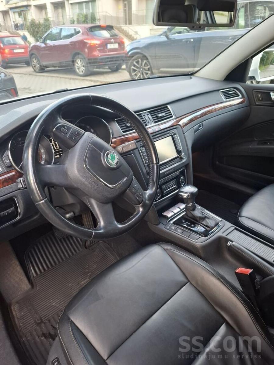 White Skoda SuperB 2012 in Riga, with an engine capacity of 2.00 L and mileage of 217 thousand km for 4050 €, photo 5 on AUTOMOTO.COM.LV