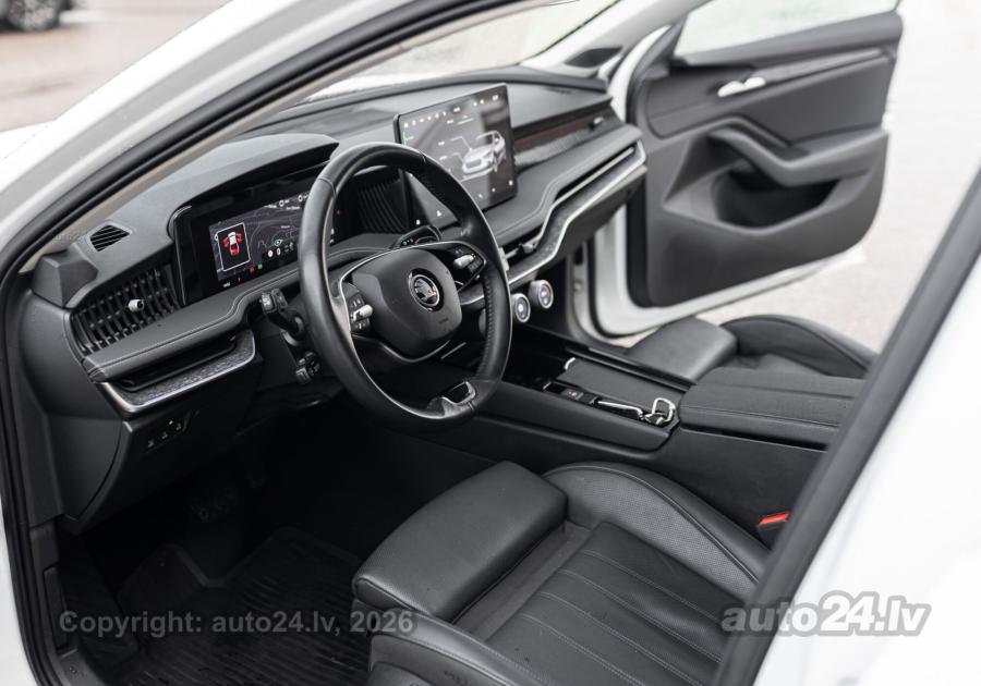 White Skoda SuperB 2024 in Tallinn, with an engine capacity of 2.00 L and mileage of 115 thousand km for 34900 €, photo 8 on AUTOMOTO.COM.LV