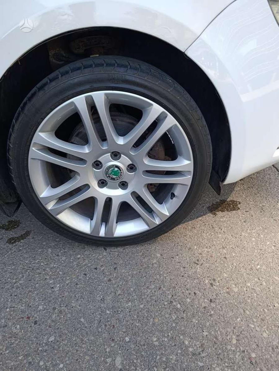 White Skoda SuperB 2011 in Vilnius, with an engine capacity of 1.80 L and mileage of 216 thousand km for 4500 €, photo 8 on AUTOMOTO.COM.LV