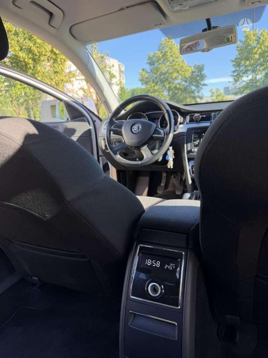 White Skoda SuperB 2014 in Kaunas, with an engine capacity of 1.60 L and mileage of 234 thousand km for 6999 €, photo 12 on AUTOMOTO.COM.LV