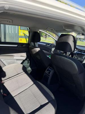 White Skoda SuperB 2014 in Kaunas, with an engine capacity of 1.60 L and mileage of 234 thousand km for 6999 €, photo 13 on AUTOMOTO.COM.LV