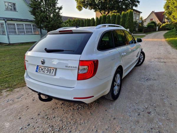 White Skoda SuperB 2014 in Kelme, with an engine capacity of 1.97 L and mileage of 311 thousand km for 4950 €, photo 4 on AUTOMOTO.COM.LV