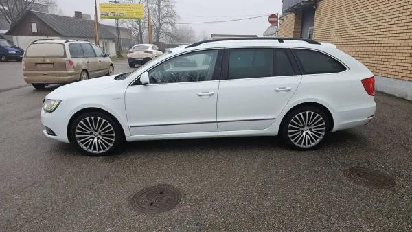 White Skoda SuperB 2015 in Riga, with an engine capacity of 2.00 L and mileage of 226 thousand km for 8950 €, photo 8 on AUTOMOTO.COM.LV