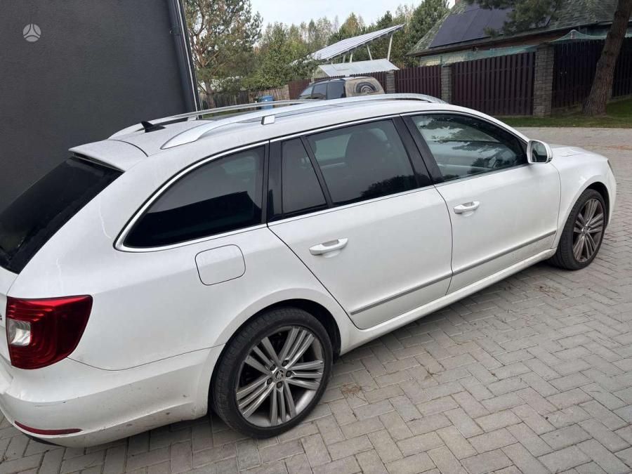 White Skoda SuperB 2015 in Vilnius, with an engine capacity of 1.97 L and mileage of 290 thousand km for 6050 €, photo 4 on AUTOMOTO.COM.LV