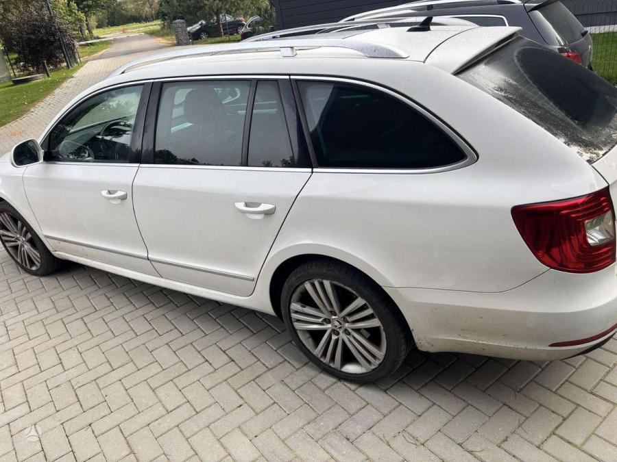 White Skoda SuperB 2015 in Vilnius, with an engine capacity of 1.97 L and mileage of 290 thousand km for 6050 €, photo 5 on AUTOMOTO.COM.LV