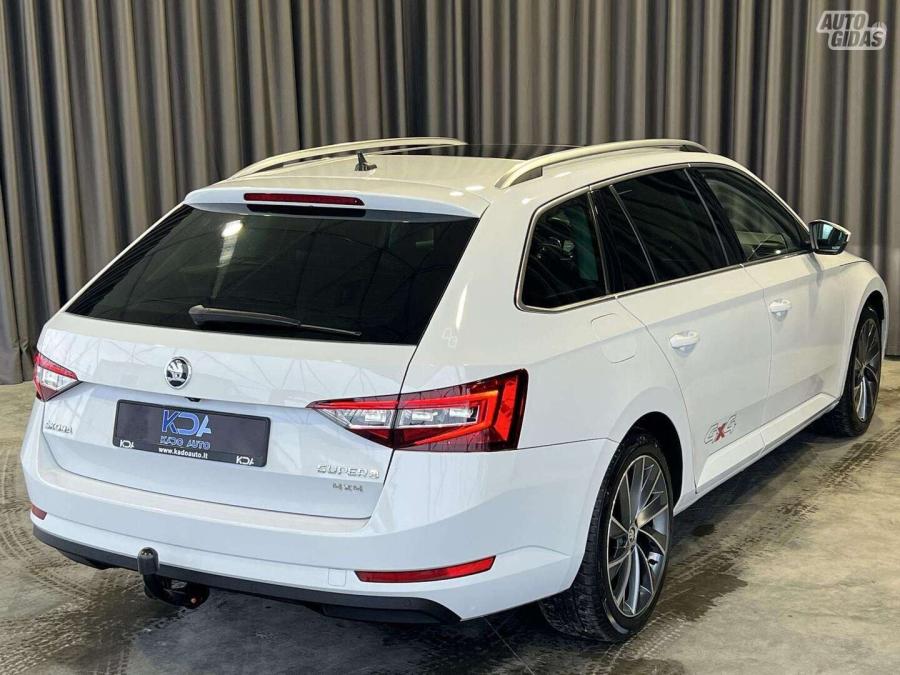 White Skoda SuperB 2018 in Marijampole, with an engine capacity of 2.00 L and mileage of 237 thousand km for 14950 €, photo 13 on AUTOMOTO.COM.LV