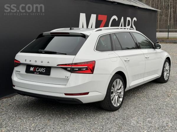 White Skoda SuperB 2022 in Riga, with an engine capacity of 1.40 L and mileage of 184 thousand km for 18990 €, photo 3 on AUTOMOTO.COM.LV