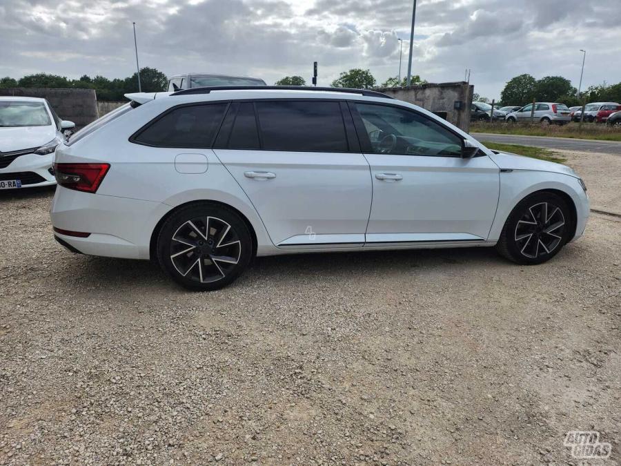 White Skoda SuperB 2023 in Vilnius, with an engine capacity of 2.00 L and mileage of 268 thousand km for 17700 €, photo 4 on AUTOMOTO.COM.LV