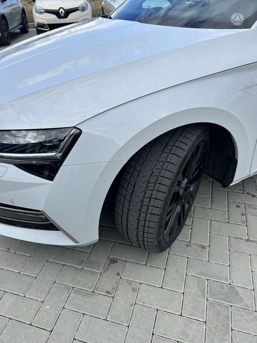 White Skoda SuperB 2023 in Taurage, with an engine capacity of 1.97 L and mileage of 274 thousand km for 16800 €, photo 12 on AUTOMOTO.COM.LV