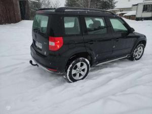 Black Skoda Yeti 2011 in Moletai, with an engine capacity of 1.97 L and mileage of 238 thousand km for 4500 €, photo 4 on AUTOMOTO.COM.LV