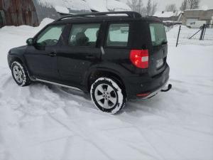 Black Skoda Yeti 2011 in Moletai, with an engine capacity of 1.97 L and mileage of 238 thousand km for 4500 €, photo 5 on AUTOMOTO.COM.LV
