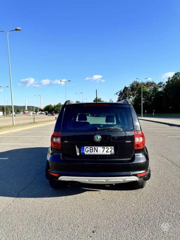 Black Skoda Yeti 2012 in Vilnius, with an engine capacity of 1.97 L and mileage of 273 thousand km for 4850 €, photo 6 on AUTOMOTO.COM.LV
