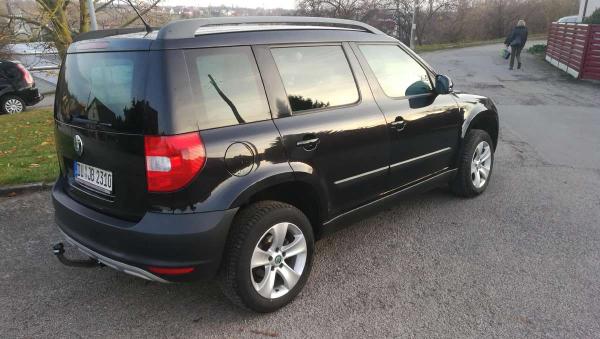 Black Skoda Yeti 2013 in Kelme, with an engine capacity of 1.97 L and mileage of 234 thousand km for 5100 €, photo 11 on AUTOMOTO.COM.LV
