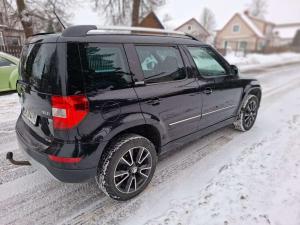Black Skoda Yeti 2014 in Utena, with an engine capacity of 1.97 L and mileage of 210 thousand km for 7600 €, photo 11 on AUTOMOTO.COM.LV