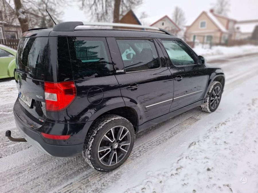 Black Skoda Yeti 2014 in Utena, with an engine capacity of 1.97 L and mileage of 210 thousand km for 7600 €, photo 13 on AUTOMOTO.COM.LV