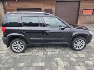 Black Skoda Yeti 2011 in Plunge, with an engine capacity of 2.00 L and mileage of 330 thousand km for 4950 €, photo 11 on AUTOMOTO.COM.LV