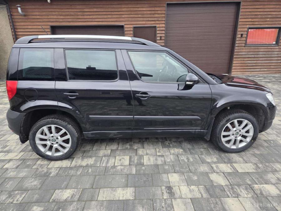 Black Skoda Yeti 2011 in Plunge, with an engine capacity of 2.00 L and mileage of 330 thousand km for 4950 €, photo 11 on AUTOMOTO.COM.LV