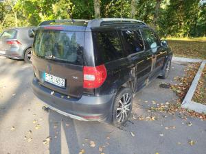 Black Skoda Yeti 2012 in Kaunas, with an engine capacity of 1.97 L and mileage of 290 thousand km for 1300 €, photo 6 on AUTOMOTO.COM.LV