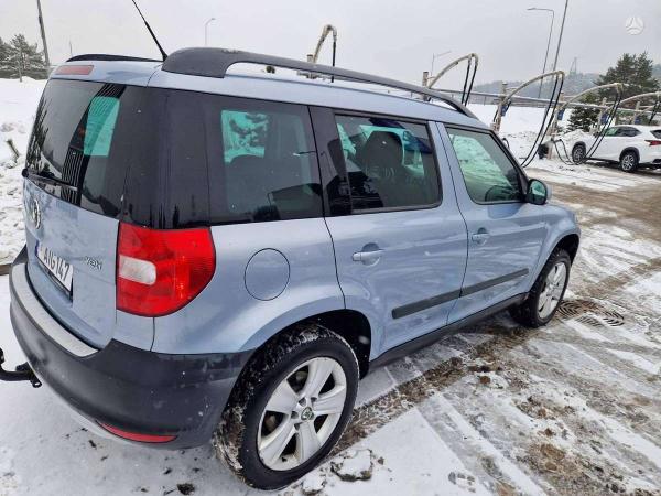 Blue Skoda Yeti 2011 in Vilnius, with an engine capacity of 1.39 L and mileage of 233 thousand km for 4850 €, photo 6 on AUTOMOTO.COM.LV