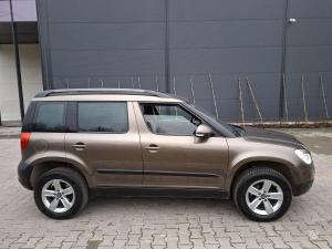 Brown Skoda Yeti 2010 in Vilnius, with an engine capacity of 1.97 L and mileage of 236 thousand km for 6650 €, photo 4 on AUTOMOTO.COM.LV