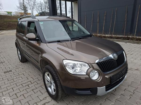 Brown Skoda Yeti 2010 in Vilnius, with an engine capacity of 2.00 L and mileage of 236 thousand km for 6550 €, photo 7 on AUTOMOTO.COM.LV