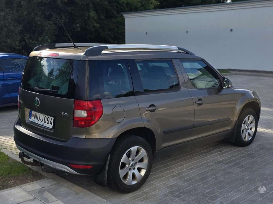 Brown Skoda Yeti 2010 in Vilnius, with an engine capacity of 1.97 L and mileage of 217 thousand km for 2700 €, photo 7 on AUTOMOTO.COM.LV