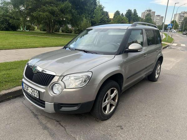 Brown Skoda Yeti 2011 in Vilnius, with an engine capacity of 1.20 L and mileage of 169 thousand km for 1089 €, photo 5 on AUTOMOTO.COM.LV