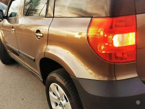 Brown Skoda Yeti 2012 in Vilnius, with an engine capacity of 1.20 L and mileage of 174 thousand km for 4790 €, photo 14 on AUTOMOTO.COM.LV