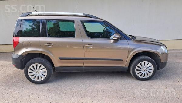 Brown Skoda Yeti 2012 in Ogre, with an engine capacity of 1.20 L and mileage of 209 thousand km for 6350 €, photo 6 on AUTOMOTO.COM.LV
