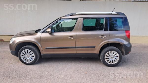 Brown Skoda Yeti 2012 in Ogre, with an engine capacity of 1.20 L and mileage of 209 thousand km for 6350 €, photo 8 on AUTOMOTO.COM.LV
