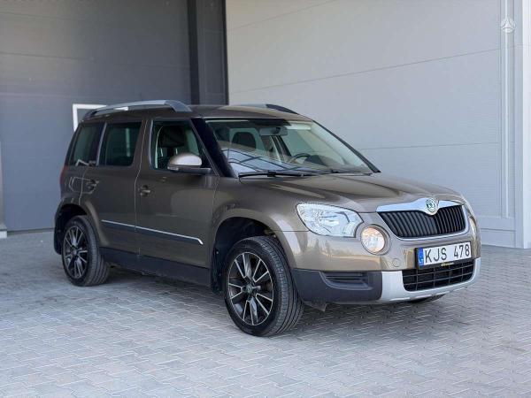 Brown Skoda Yeti 2013 in Vilnius, with an engine capacity of 1.97 L and mileage of 122 thousand km for 5490 €, photo 8 on AUTOMOTO.COM.LV