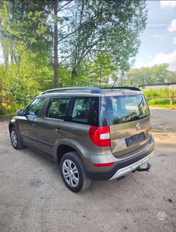 Brown Skoda Yeti 2014 in Ignalina, with an engine capacity of 1.97 L and mileage of 250 thousand km for 6650 €, photo 5 on AUTOMOTO.COM.LV