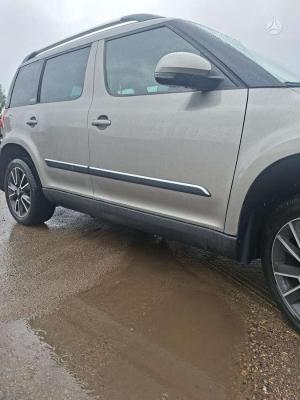 Brown Skoda Yeti 2013 in Vilnius, with an engine capacity of 1.20 L and mileage of 122 thousand km for 3700 €, photo 4 on AUTOMOTO.COM.LV