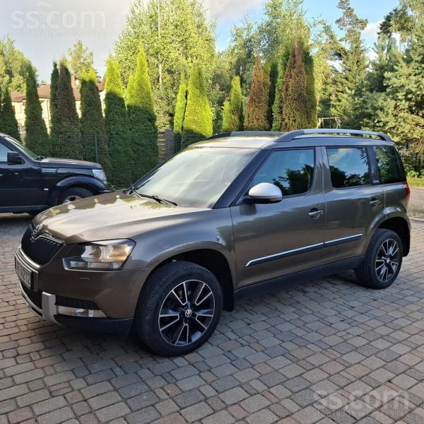 Brown Skoda Yeti 2015 in Riga, with an engine capacity of 2.00 L and mileage of 244 thousand km for 4600 €, photo 4 on AUTOMOTO.COM.LV
