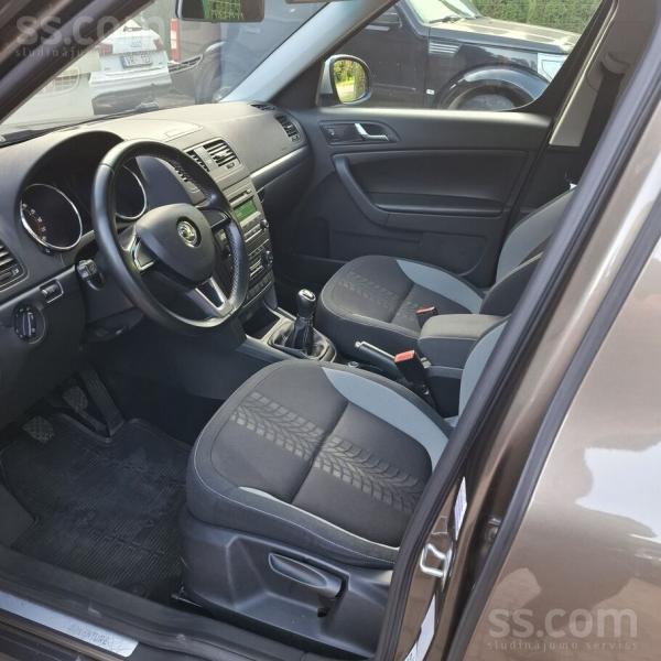 Brown Skoda Yeti 2015 in Riga, with an engine capacity of 2.00 L and mileage of 244 thousand km for 4600 €, photo 6 on AUTOMOTO.COM.LV