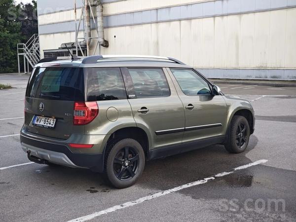 Green Skoda Yeti 2015 in Riga, with an engine capacity of 2.00 L and mileage of 266 thousand km for 7450 €, photo 5 on AUTOMOTO.COM.LV