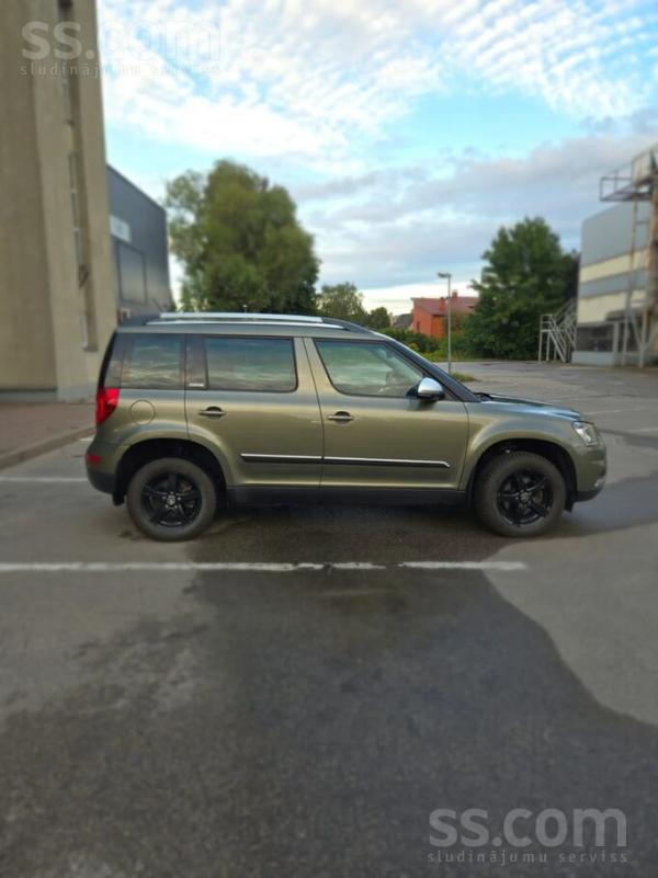 Green Skoda Yeti 2015 in Riga, with an engine capacity of 2.00 L and mileage of 266 thousand km for 7450 €, photo 4 on AUTOMOTO.COM.LV
