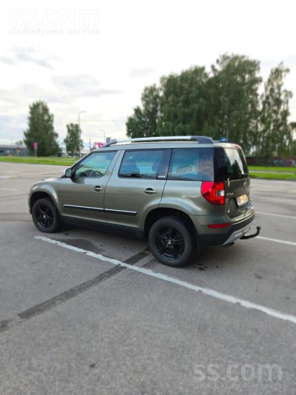 Green Skoda Yeti 2015 in Riga, with an engine capacity of 2.00 L and mileage of 266 thousand km for 7450 €, photo 9 on AUTOMOTO.COM.LV