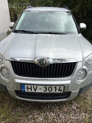 Grey Skoda Yeti 2012 in Riga, with an engine capacity of 2.00 L and mileage of 245 thousand km for 3700 €, photo 4 on AUTOMOTO.COM.LV