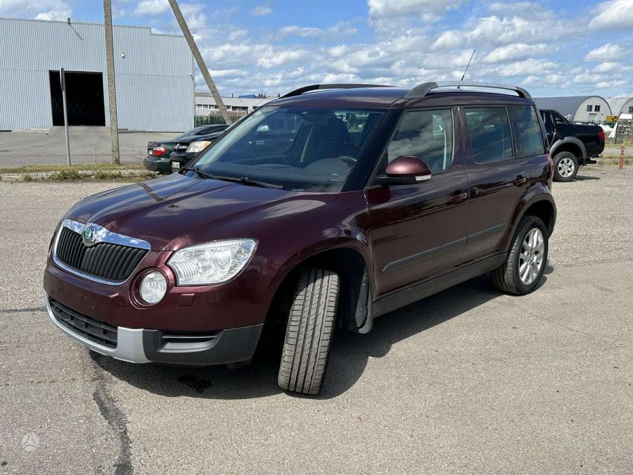 Red Skoda Yeti 2011 in Marijampole, with an engine capacity of 1.20 L and mileage of 220 thousand km for 4199 €, photo 4 on AUTOMOTO.COM.LV