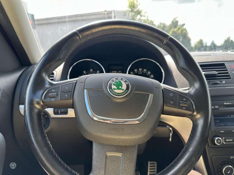 Red Skoda Yeti 2011 in Marijampole, with an engine capacity of 1.20 L and mileage of 220 thousand km for 4199 €, photo 19 on AUTOMOTO.COM.LV