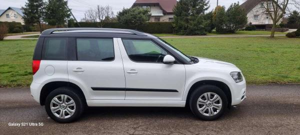 White Skoda Yeti 2014 in Kedainiai, with an engine capacity of 1.20 L and mileage of 221 thousand km for 4999 €, photo 6 on AUTOMOTO.COM.LV