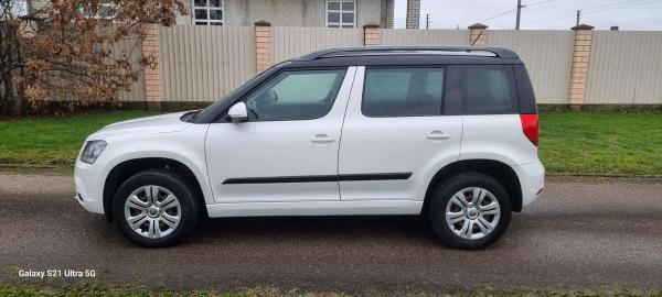 White Skoda Yeti 2014 in Kedainiai, with an engine capacity of 1.20 L and mileage of 221 thousand km for 4999 €, photo 7 on AUTOMOTO.COM.LV