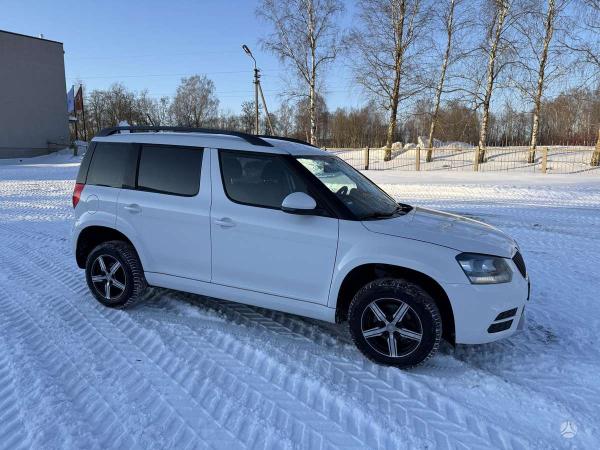 White Skoda Yeti 2014 in Panevezys, with an engine capacity of 1.20 L and mileage of 246 thousand km for 6200 €, photo 11 on AUTOMOTO.COM.LV
