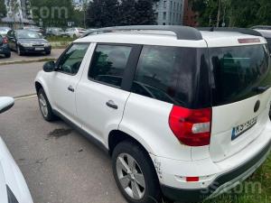 White Skoda Yeti 2014 in Riga, with an engine capacity of 1.60 L and mileage of 262 thousand km for 2500 €, photo 7 on AUTOMOTO.COM.LV