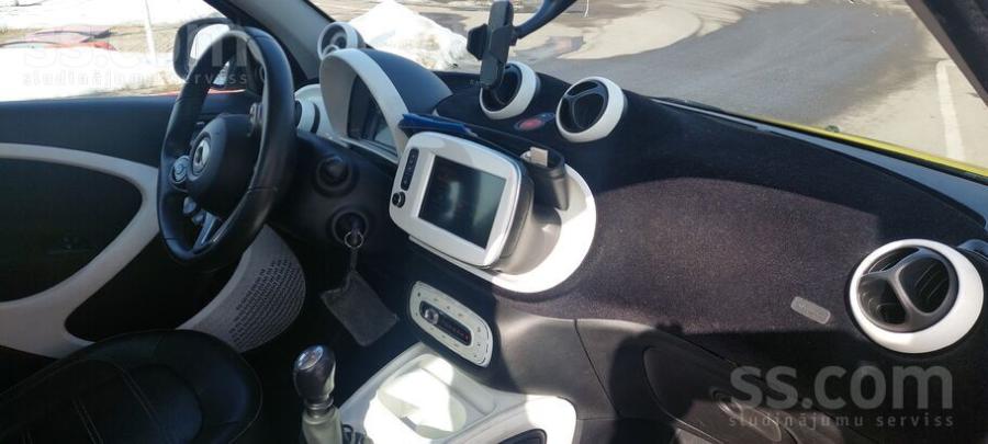 Yellow Smart Forfour 2015 in Riga, with an engine capacity of 0.90 L and mileage of 167 thousand km for 6200 €, photo 9 on AUTOMOTO.COM.LV