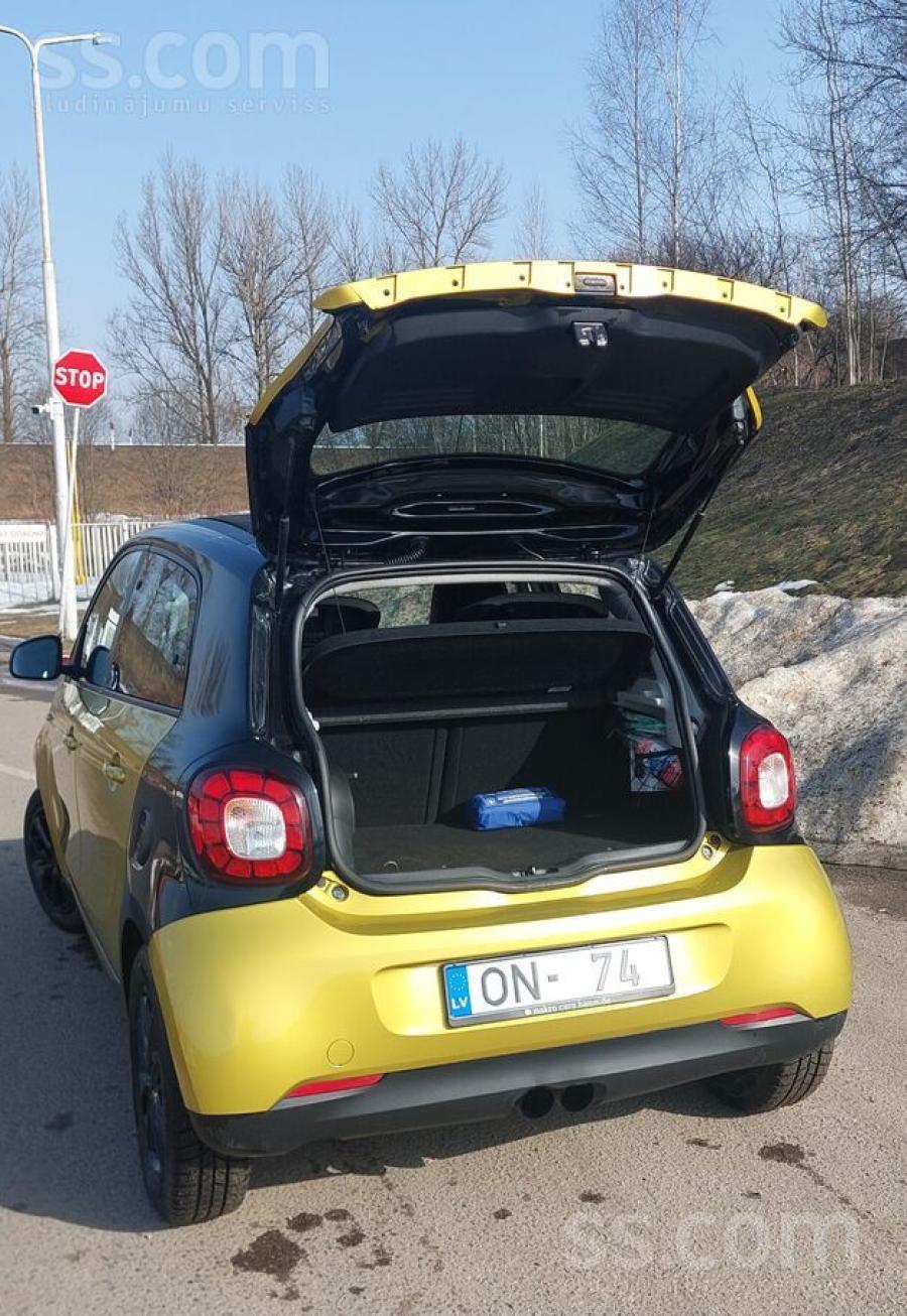 Yellow Smart Forfour 2015 in Riga, with an engine capacity of 0.90 L and mileage of 167 thousand km for 6200 €, photo 15 on AUTOMOTO.COM.LV