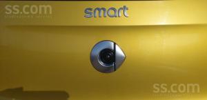 Yellow Smart Forfour 2015 in Riga, with an engine capacity of 0.90 L and mileage of 167 thousand km for 6200 €, photo 18 on AUTOMOTO.COM.LV