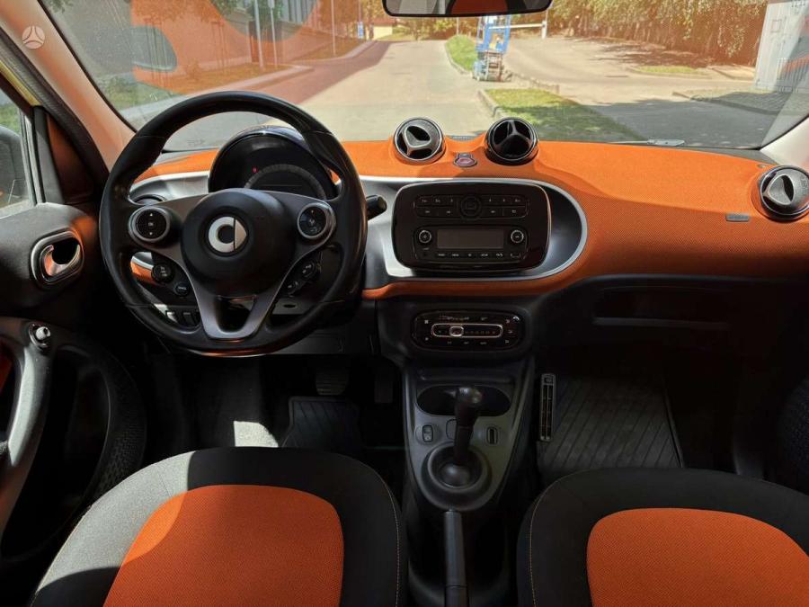 Yellow Smart Forfour 2017 in Vilnius, with an engine capacity of 1.00 L and mileage of 156 thousand km for 7500 €, photo 16 on AUTOMOTO.COM.LV